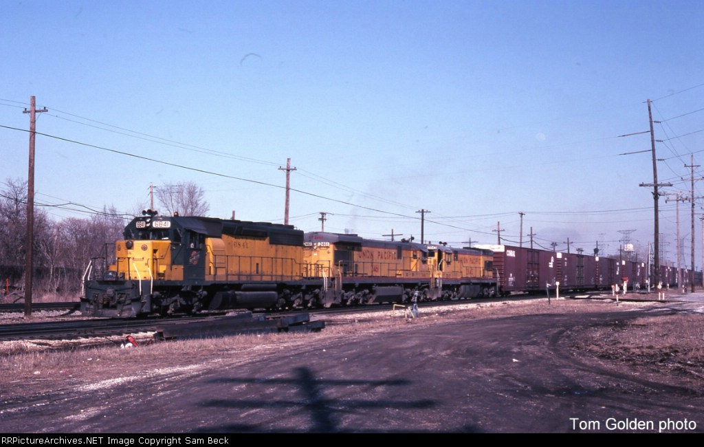 CNW 6841 and UP 2461